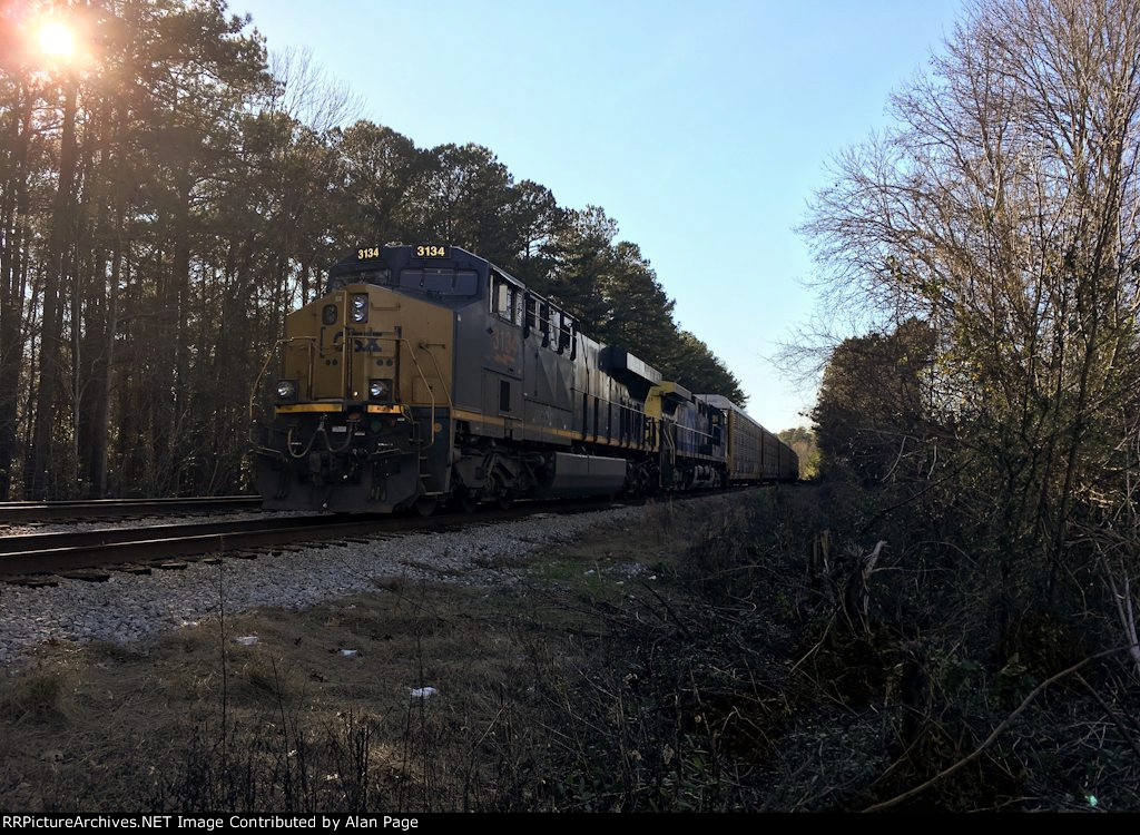 CSX 3134 and 21 wait for NB green with autoracks
